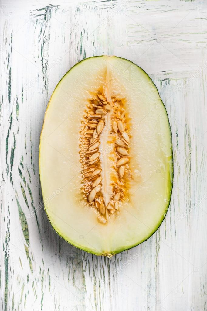 Half of melon with seeds Stock Photo by ©Vfotografie 118971092