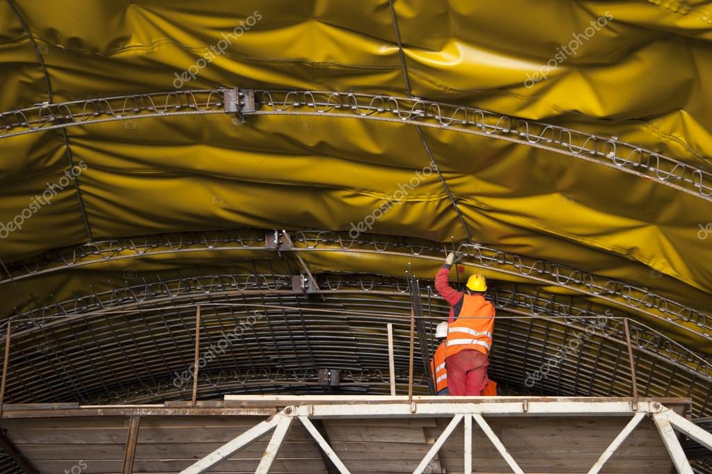 Construction workers in red on yellow background Stock Photo by ©mrak ...