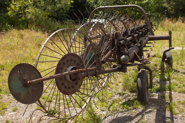 Old hay making machine Pictures, Old hay making machine Stock Photos ...