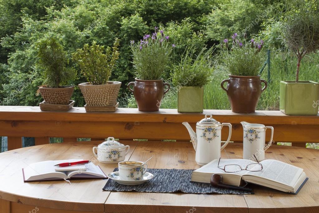 Cup of coffee on the terrace, relax with a book, a time for pipe Stock ...