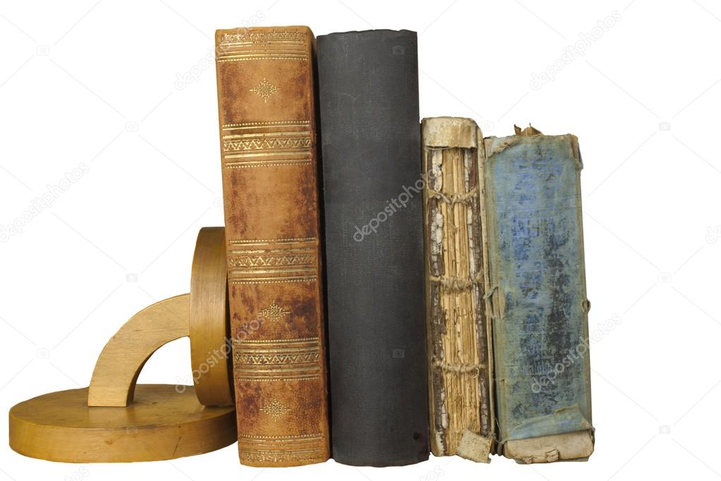 Front view of old books stacked on a shelf. Books without title and ...