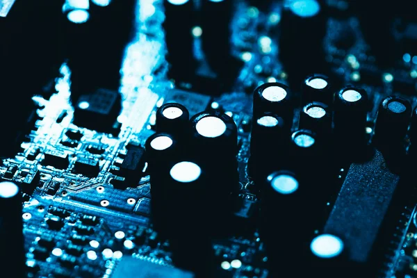 Computer motherboard in blue dark background close-up - Stock Image ...