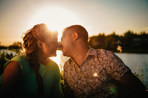 Couple at sunset kissing themselves — Stock Photo © oneinchpunch #60197083