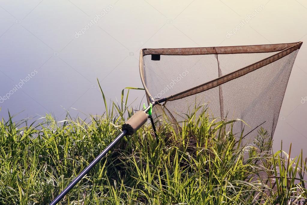 Fishing tackle: large grid for caught fish. — Stock Photo © Georgina198 ...