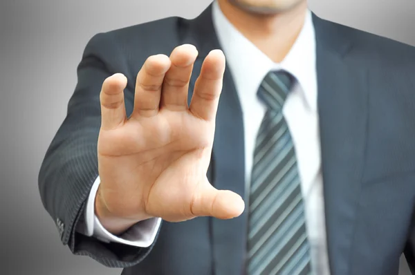Businessman hand reaching out & grabbing - can be used as abstra ...