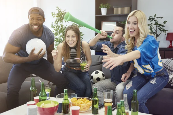 Friends watching football match - Stock Image - Everypixel