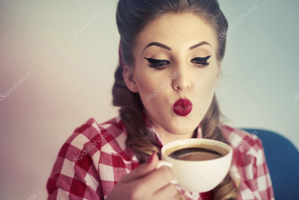 Pin up girl drinking coffee — Stock Photo © gpointstudio #110299244