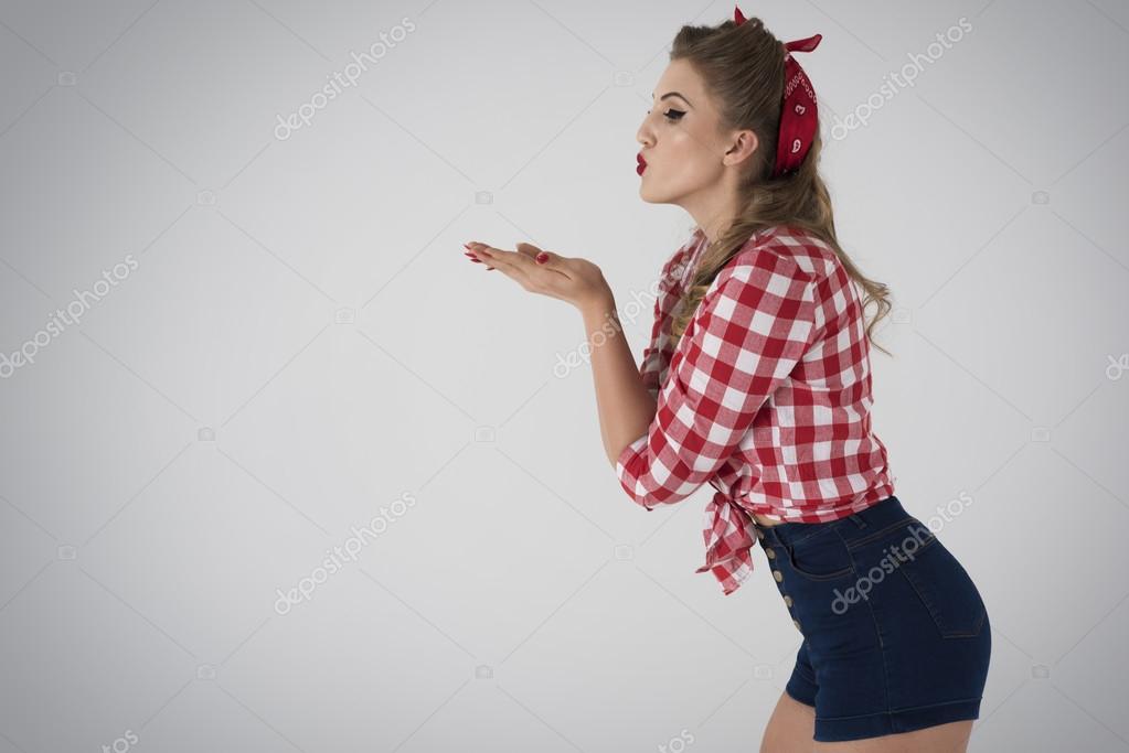 Girl Blowing A Kiss Side View