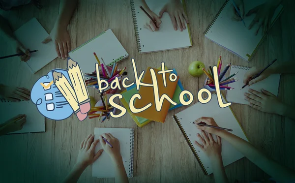 Busy students learning over one table - Stock Image - Everypixel