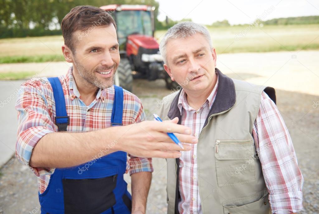 Man pointing at the field Stock Photo by ©gpointstudio 121898420