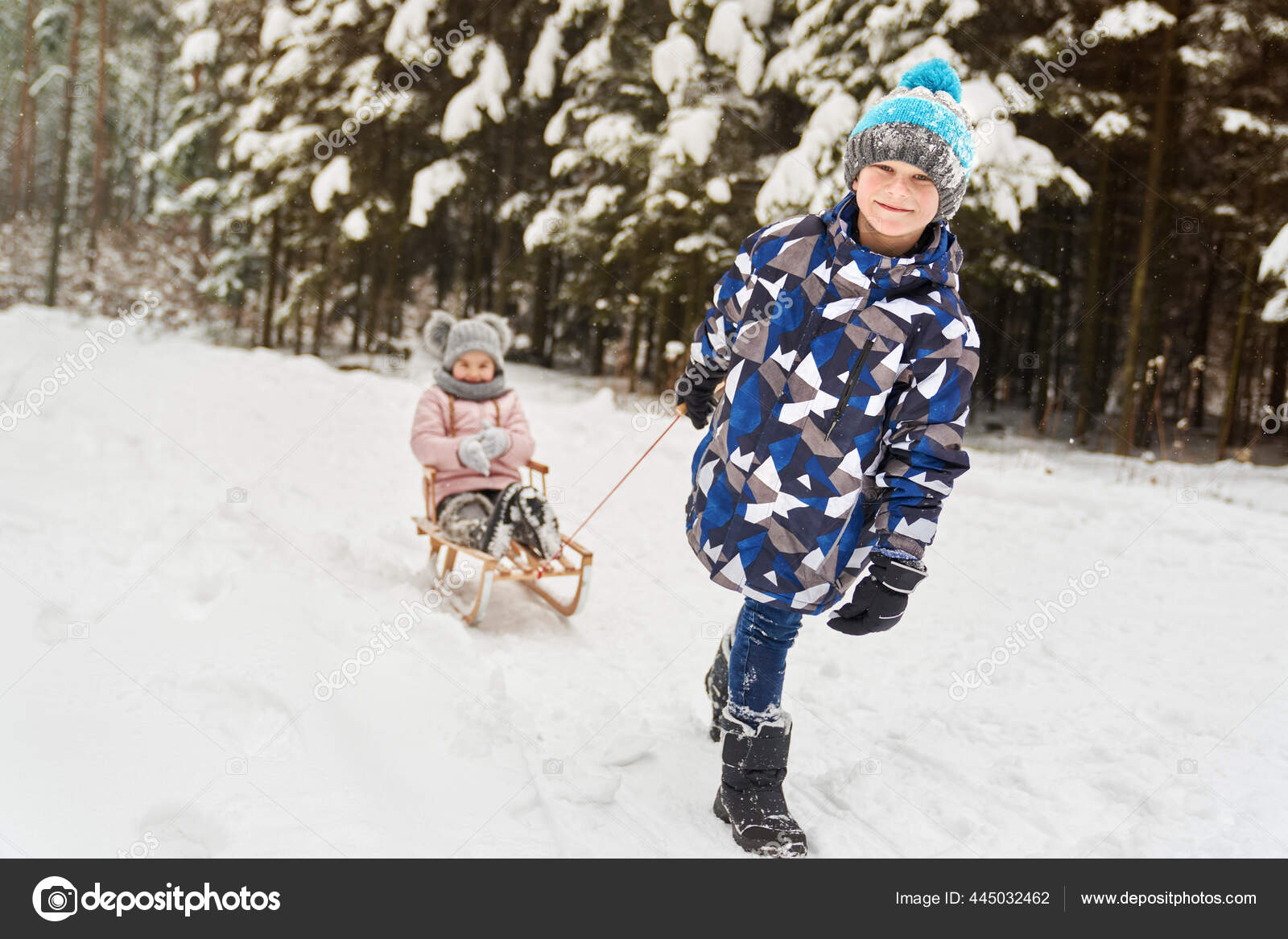 Boy Pulling Sledge Little Sister Snow Stock Photo by ©gpointstudio ...