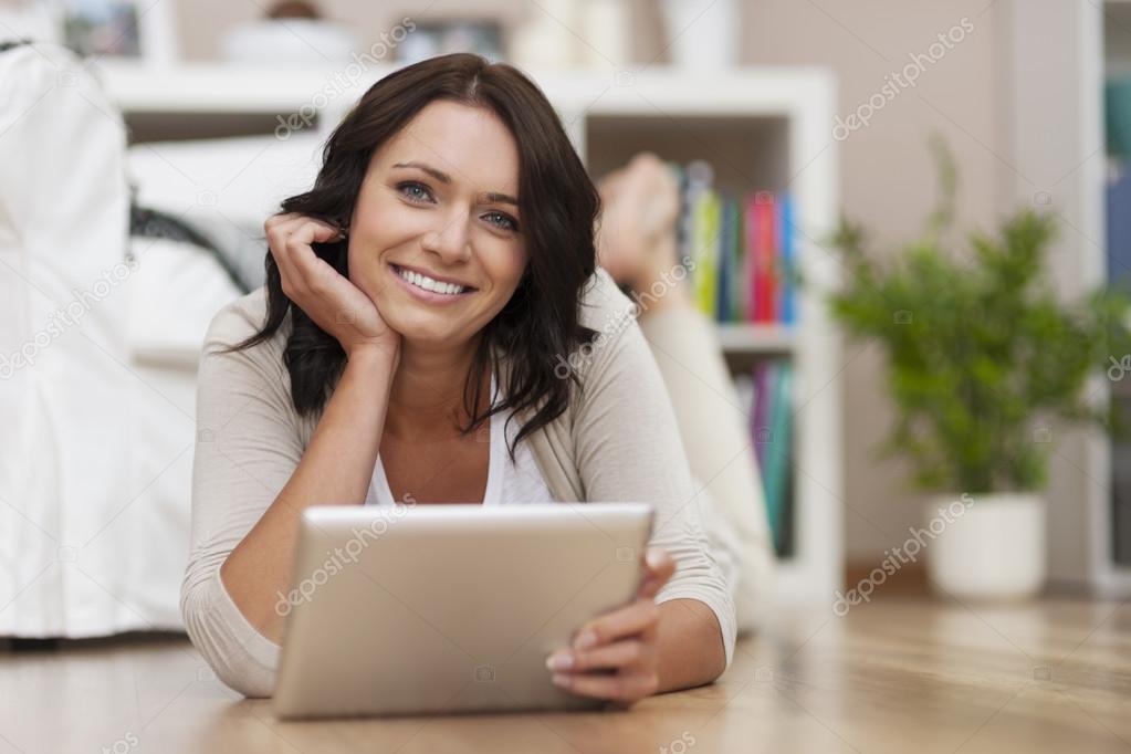 Woman using digital tablet — Stock Photo © gpointstudio #55661799 Woman using digital tablet — Stock Photo © gpointstudio #55661799