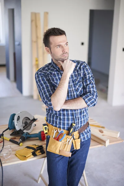 Young handsome carpenter Stock Photo by ©gpointstudio 67729349