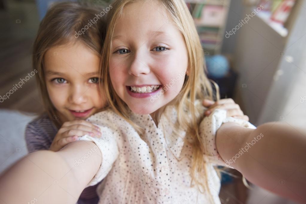 Sisters having fun together — Stock Photo © gpointstudio #96503894
