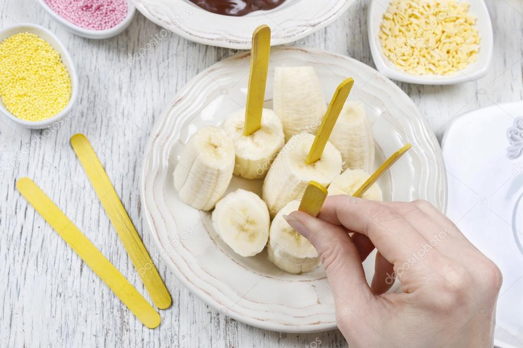 How to make chocolate dipped bananas - step by step, tutorial — Stock Photo © agneskantaruk ...