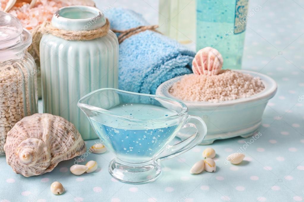 Blue spa set: liquid soap, sea salts and towels — Stock Photo ...