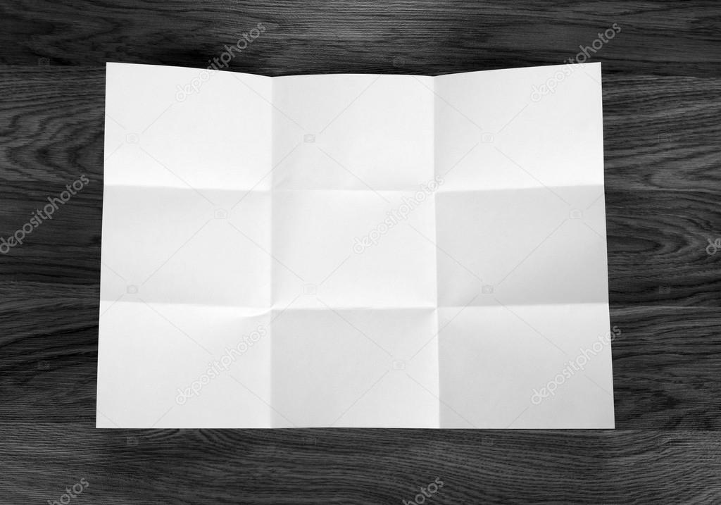 White sheet of paper folded in nine top shooting. — Stock Photo ...