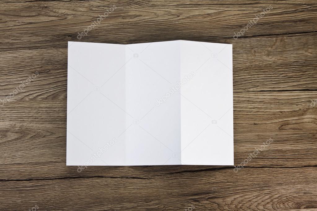 Blank white folding paper flyer Stock Photo by ©fontgraf 73262297
