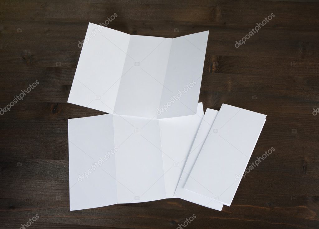 Blank white folding paper flyer Stock Photo by ©fontgraf 73898189