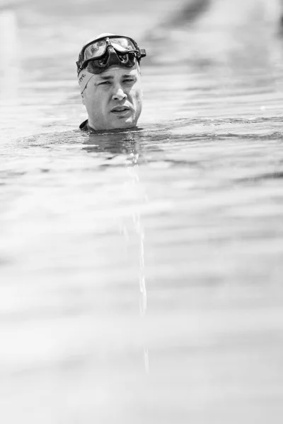 A Bald Skinny Fat Old Man Swimsuit Glaring At The Camera Meanly Full Body Images Libres De Droit