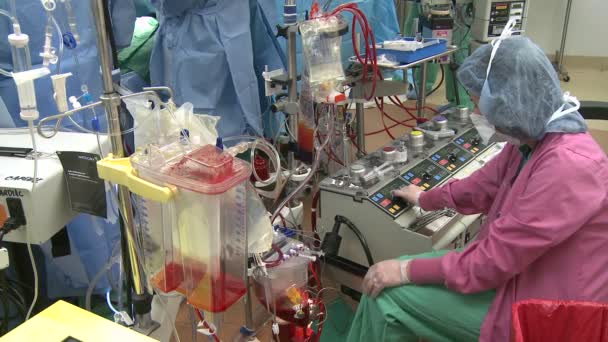 Pan down to heart lung bypass machine — Stock Video © thescenelab.com ...