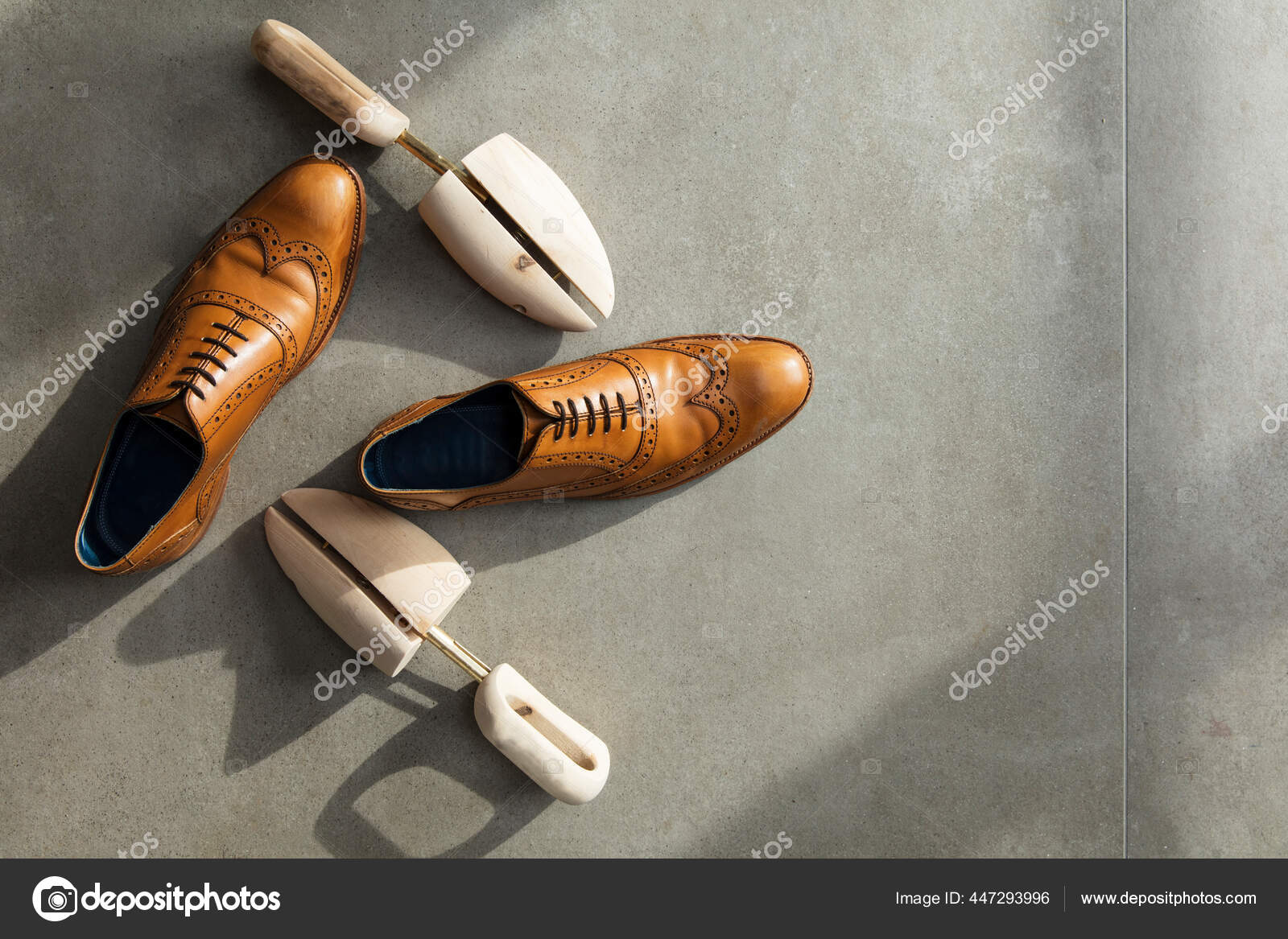 Overhead view of a pair of tan brown leather mens formal shoes on ...