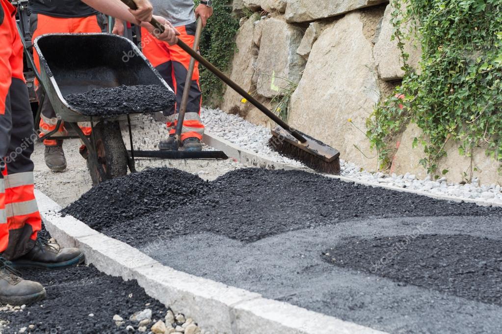 Construction workers at asphalting Stock Photo by ©alho007 116492578