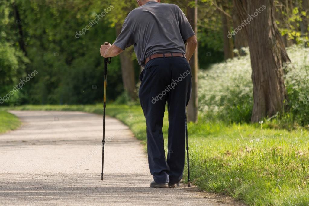 Old Man Walking With Walker