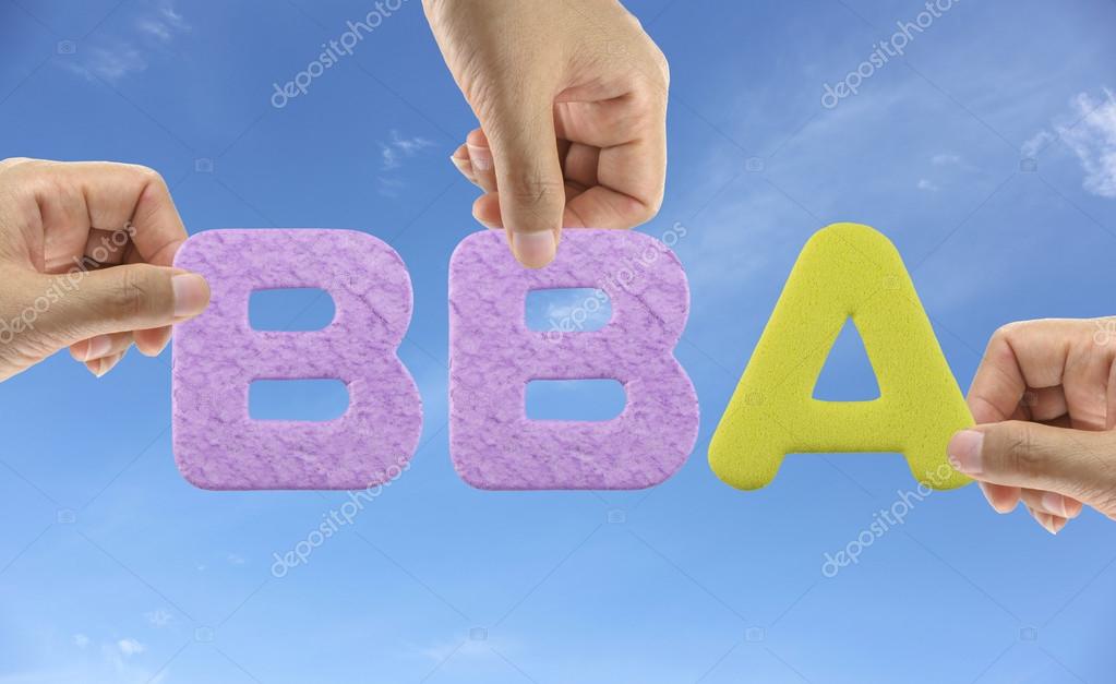 Hand arrange alphabet BBA of acronym Bachelor of Business Admini ...