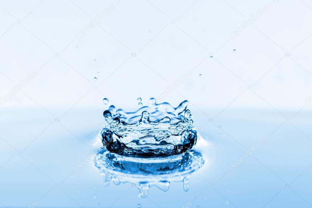 Water splash on white Stock Photo by ©Vitaly.R 110979048