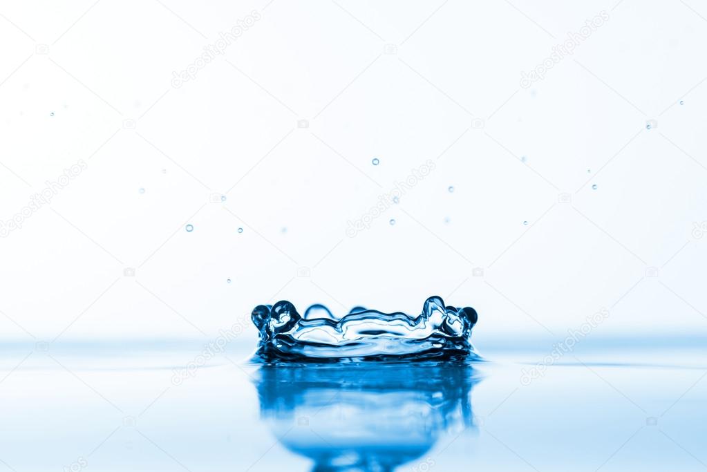 Water splash background Stock Photo by ©Vitaly.R 79360540