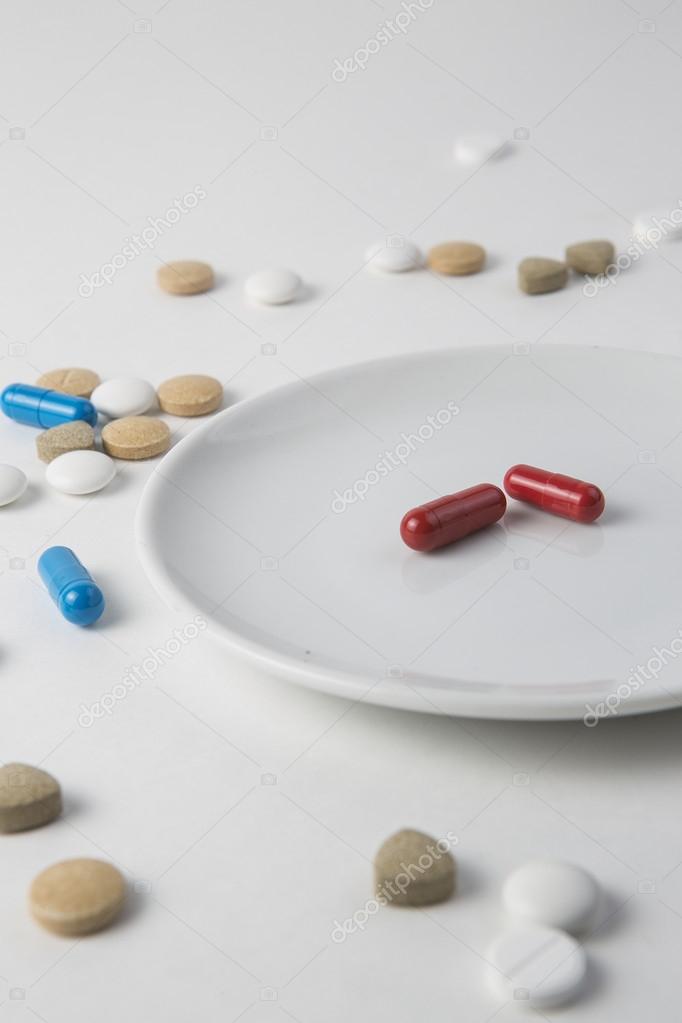 Medication tablets Stock Photo by ©Craftpoul 58660793