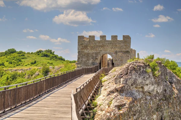 Stone walls and gate with wooden bridge on medieval fortress ⬇ Stock ...
