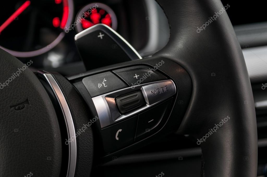 Control buttons on steering wheel. — Stock Photo © aleksdemeshko #79376522