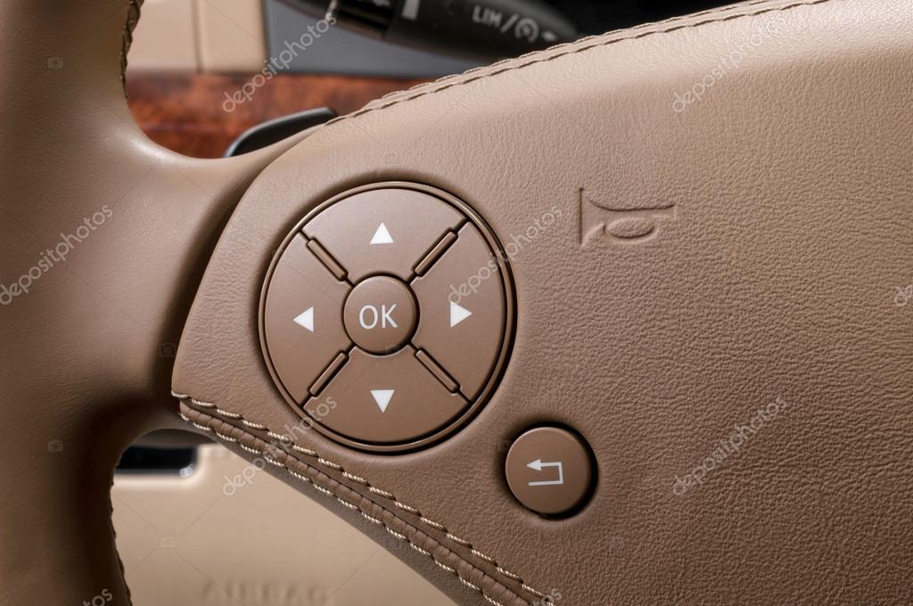 Control buttons on steering wheel. Stock Photo by ©aleksdemeshko 91016474