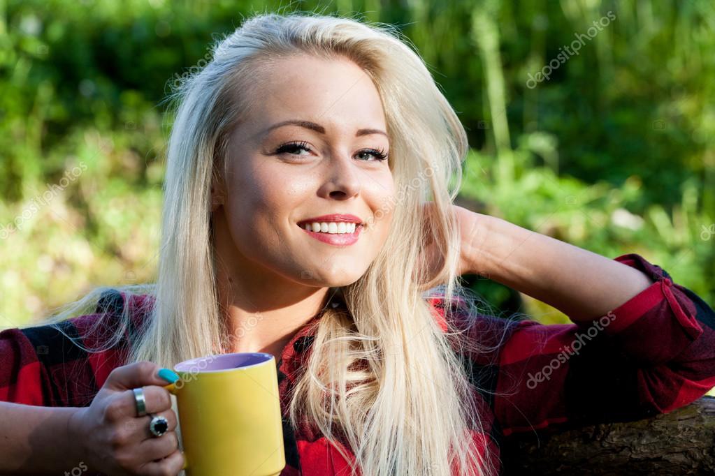 Woman in nature drinking tea Stock Photo by ©Giulio_Fornasar 75938685