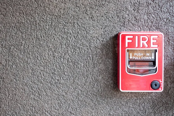 Fire alarm switch on the wall, powerful emergency equipment for ...