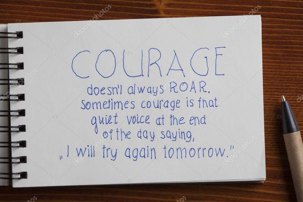 Courage handwritten text on a notebook with pen — Stock Photo ...