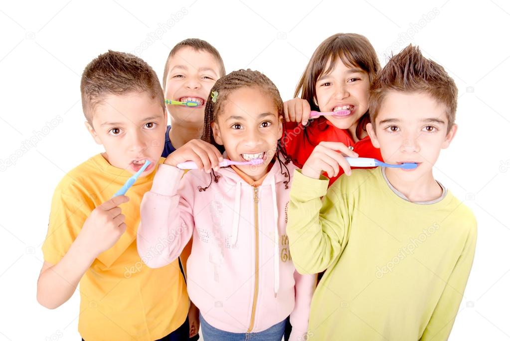 Kids brushing teeth Stock Photo by ©verkoka 106705398
