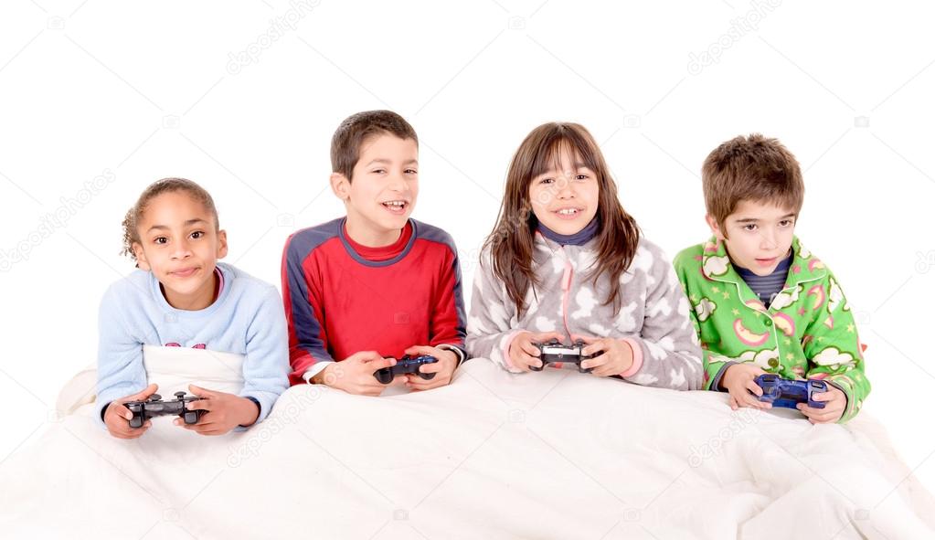 Kids playing video games — Stock Photo © verkoka #65615325