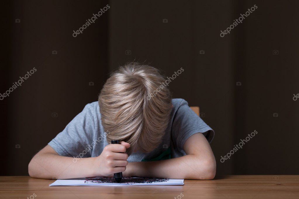 Depressed boy drawing — Stock Photo © photographee.eu #102876830