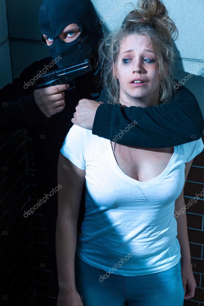 Young woman in danger Stock Photo by ©photographee.eu 106832258