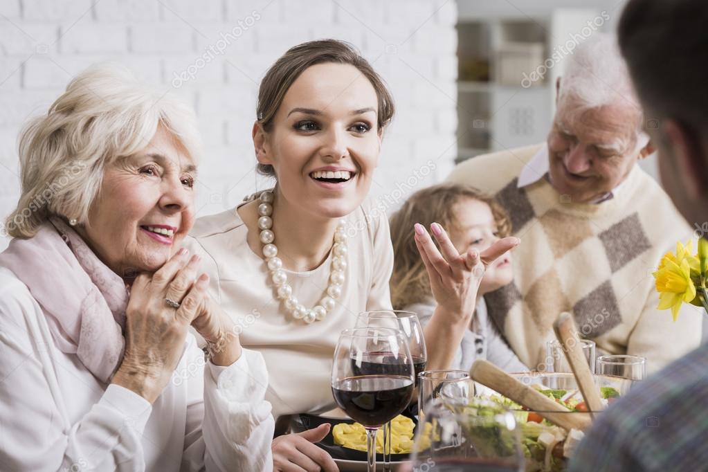 Family talking and enjoying dinner Stock Photo by ©photographee.eu ...