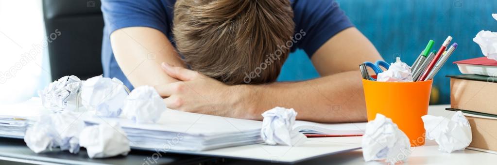 Student sleeping on the table Stock Photo by ©photographee.eu 113542584