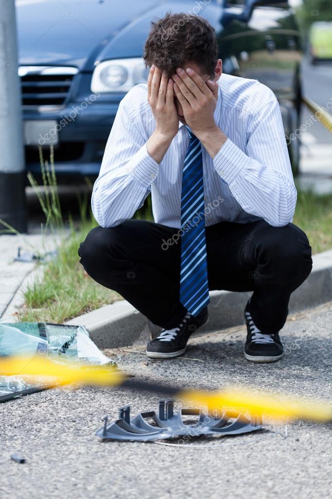 Man crying at accident scene Stock Photo by ©photographee.eu 52643045