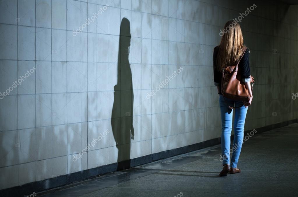 Woman walking alone at night Stock Photo by ©photographee.eu 52928435