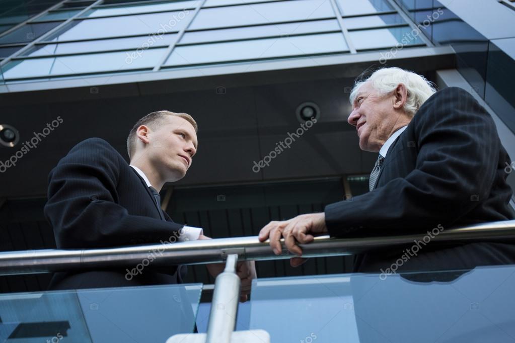 Two men conversing outside — Stock Photo © photographee.eu #59132831