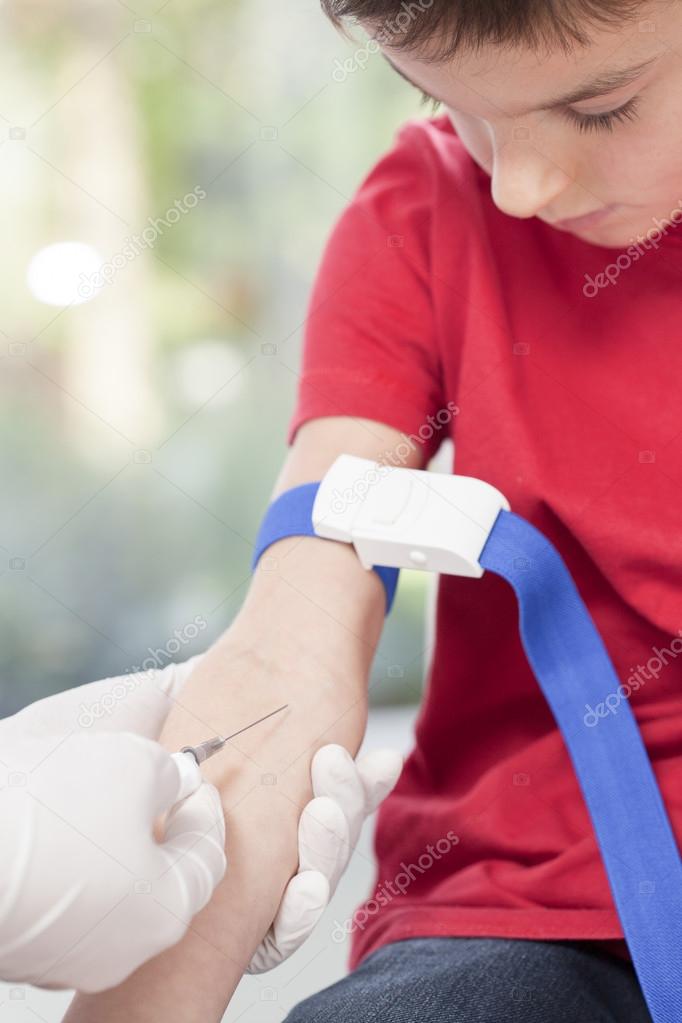 Kid on blood sampling Stock Photo by ©photographee.eu 60729623