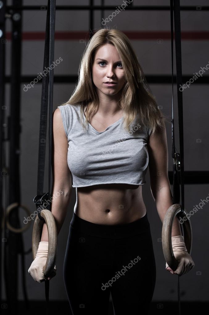Sexy girl training at the gym Stock Photo by ©photographee.eu 61622337