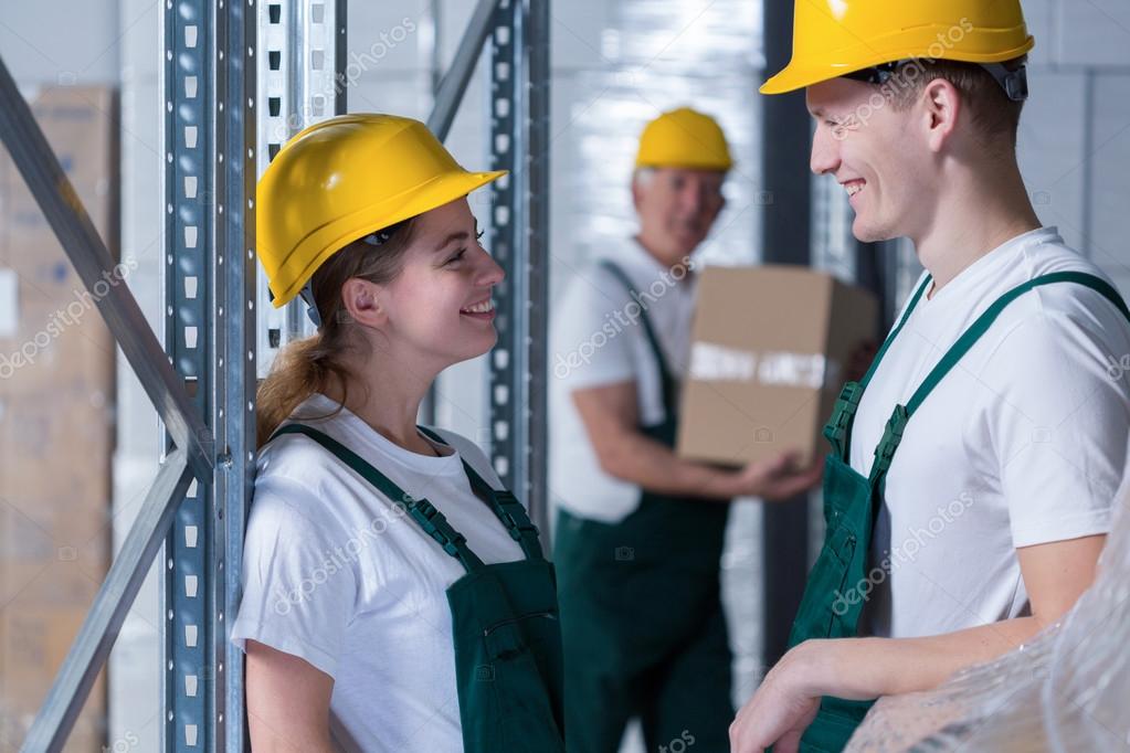 Young storage workers Stock Photo by ©photographee.eu 61738141